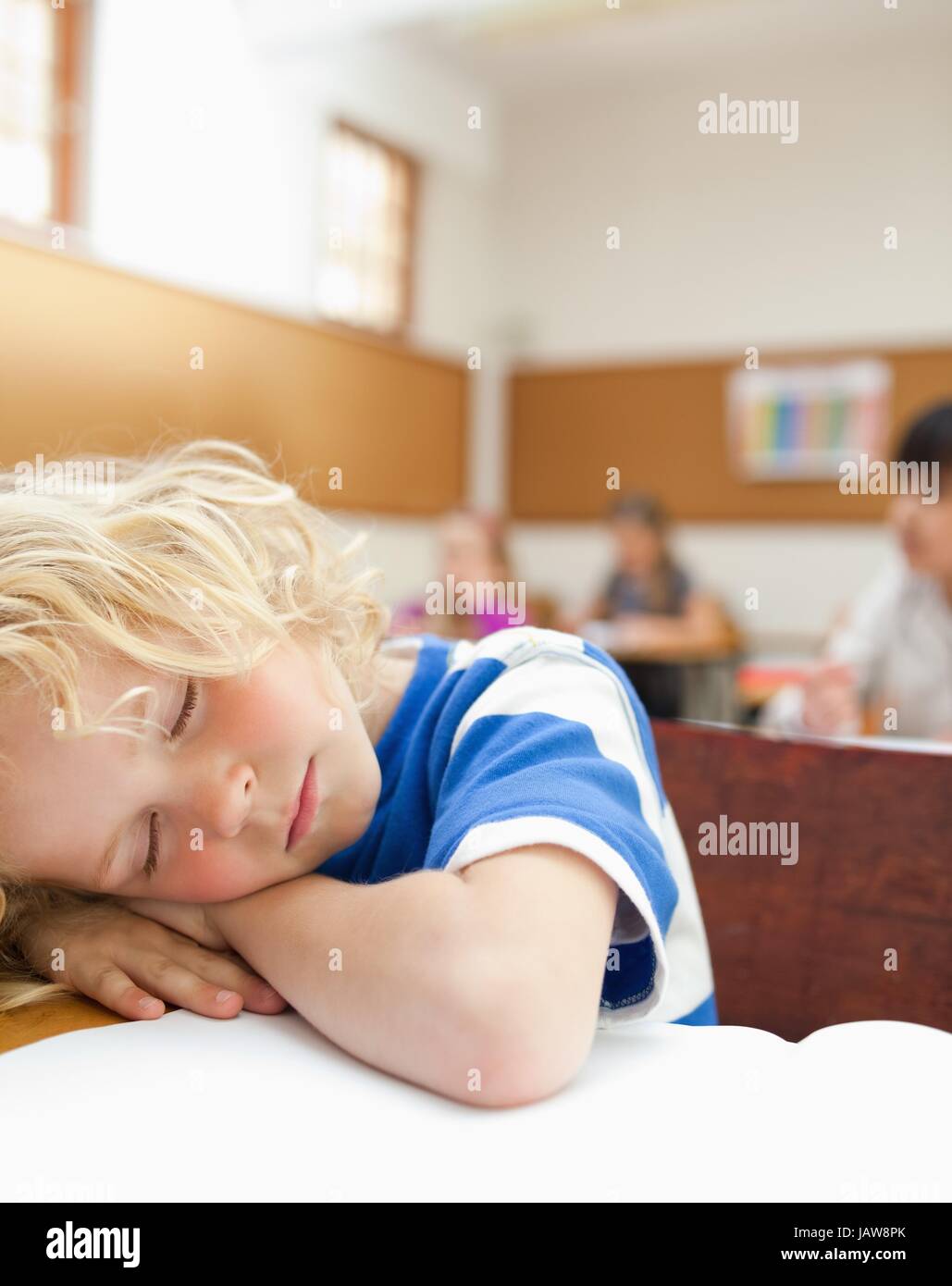 Boy taking book classroom hi-res stock photography and images - Alamy