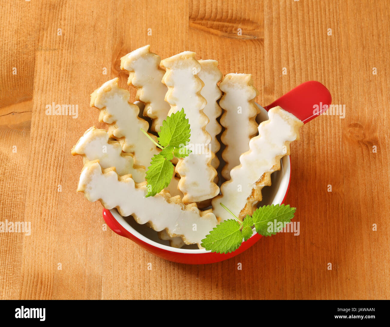 Vanilla cookies with white icing Stock Photo - Alamy