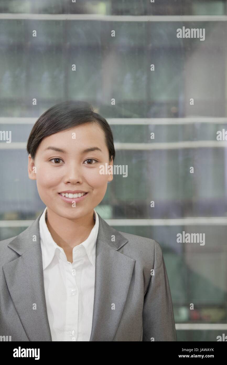 Standing looking smiling place of work authority hi-res stock ...