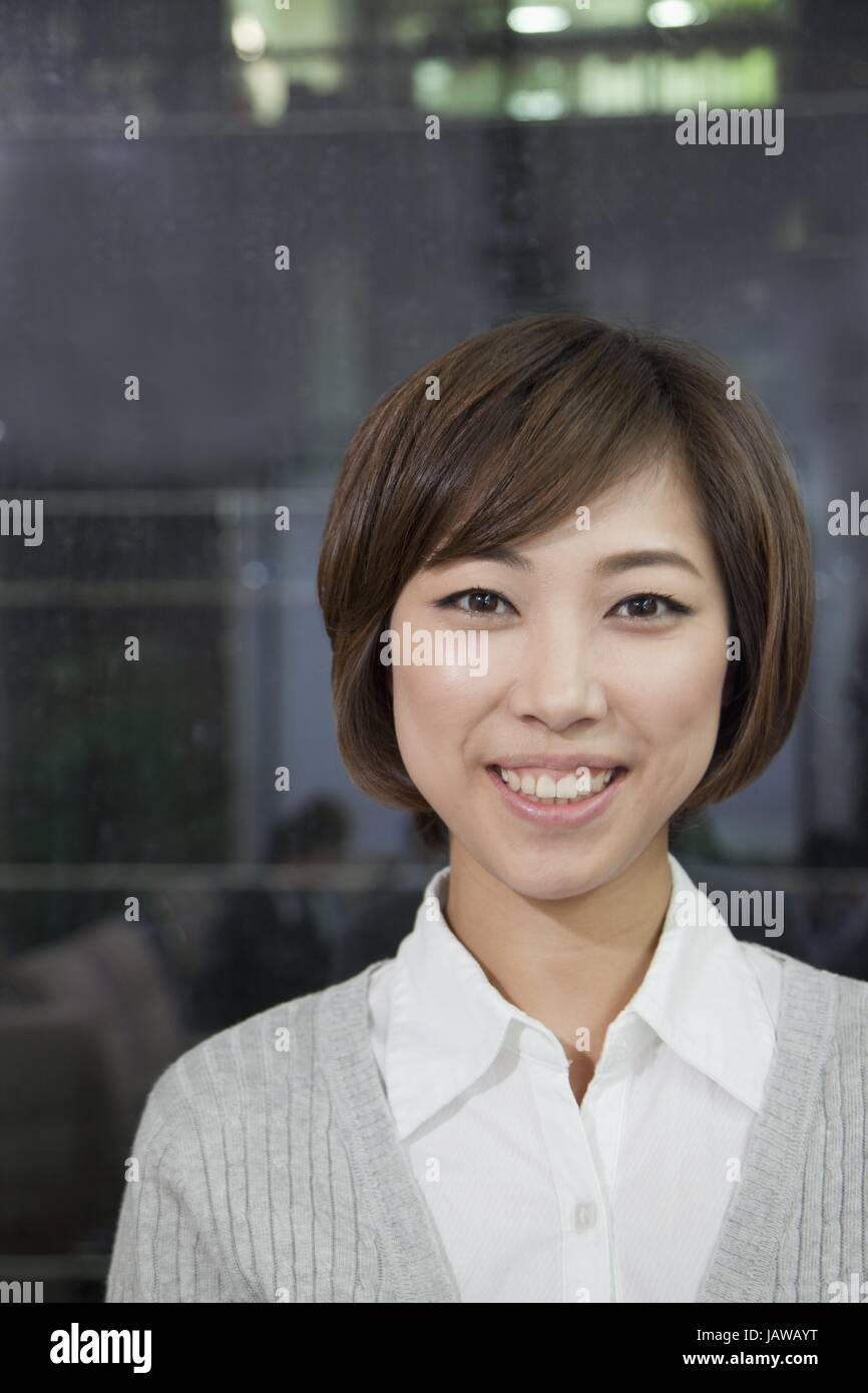 Standing looking smiling place of work authority hi-res stock ...