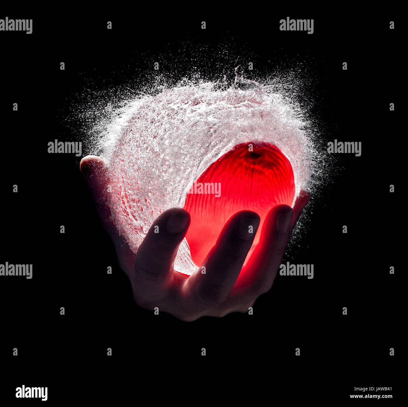 water explosion in human hand Stock Photo - Alamy