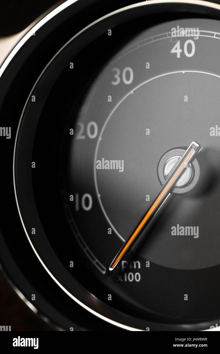 Detail of a tachometer in a car Stock Photo - Alamy