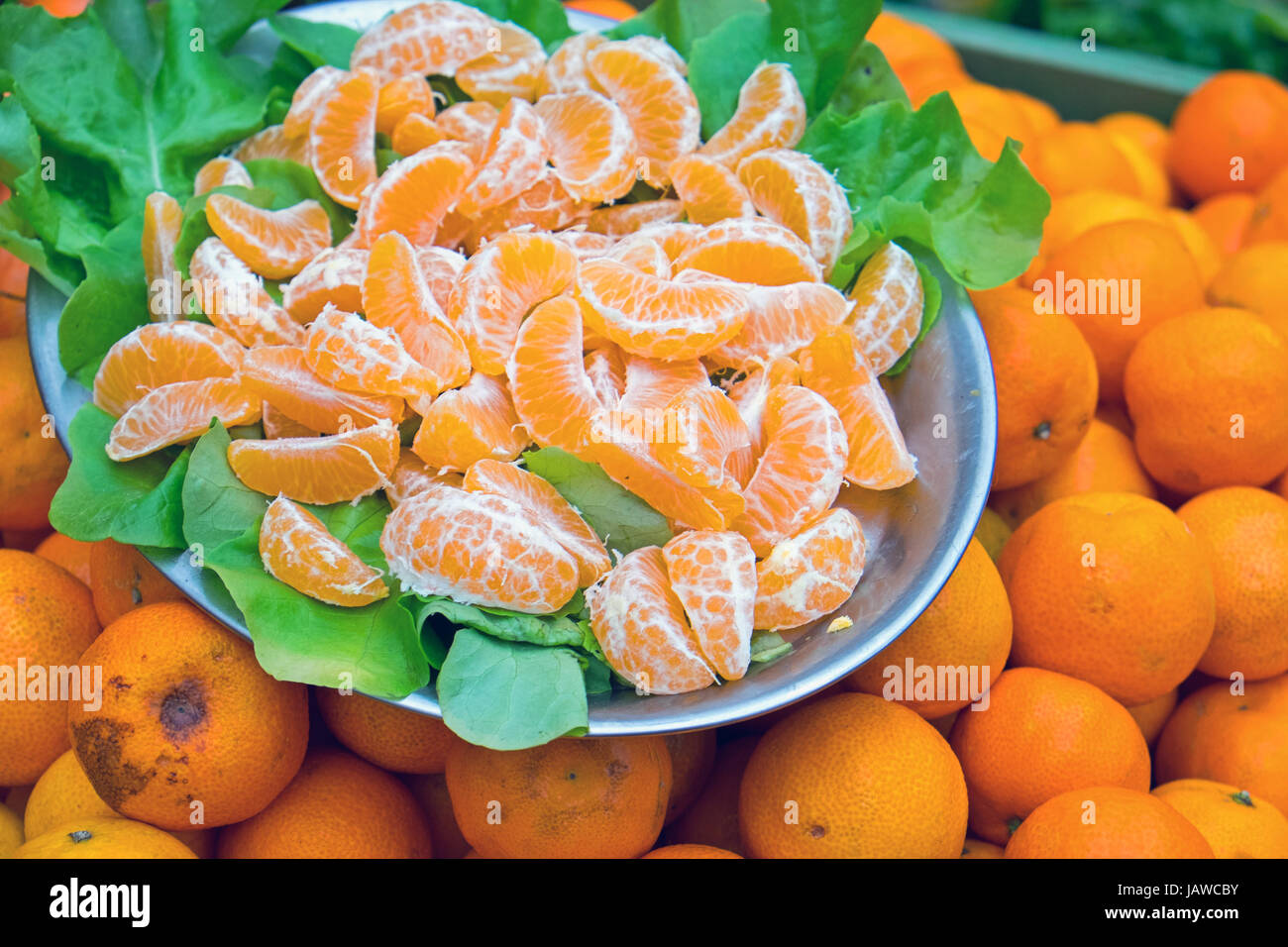 mandarin slices on a plate Stock Photo - Alamy