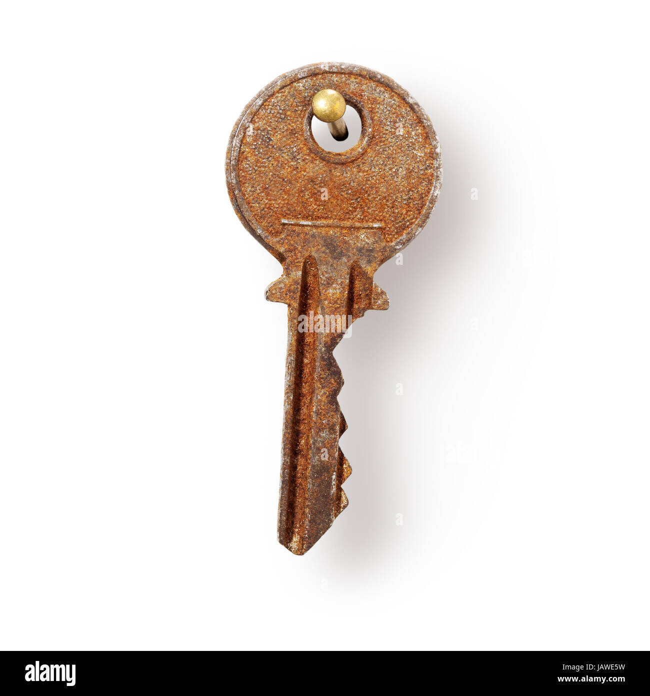 Old rusty house key hanging on nail, white background, clipping path ...
