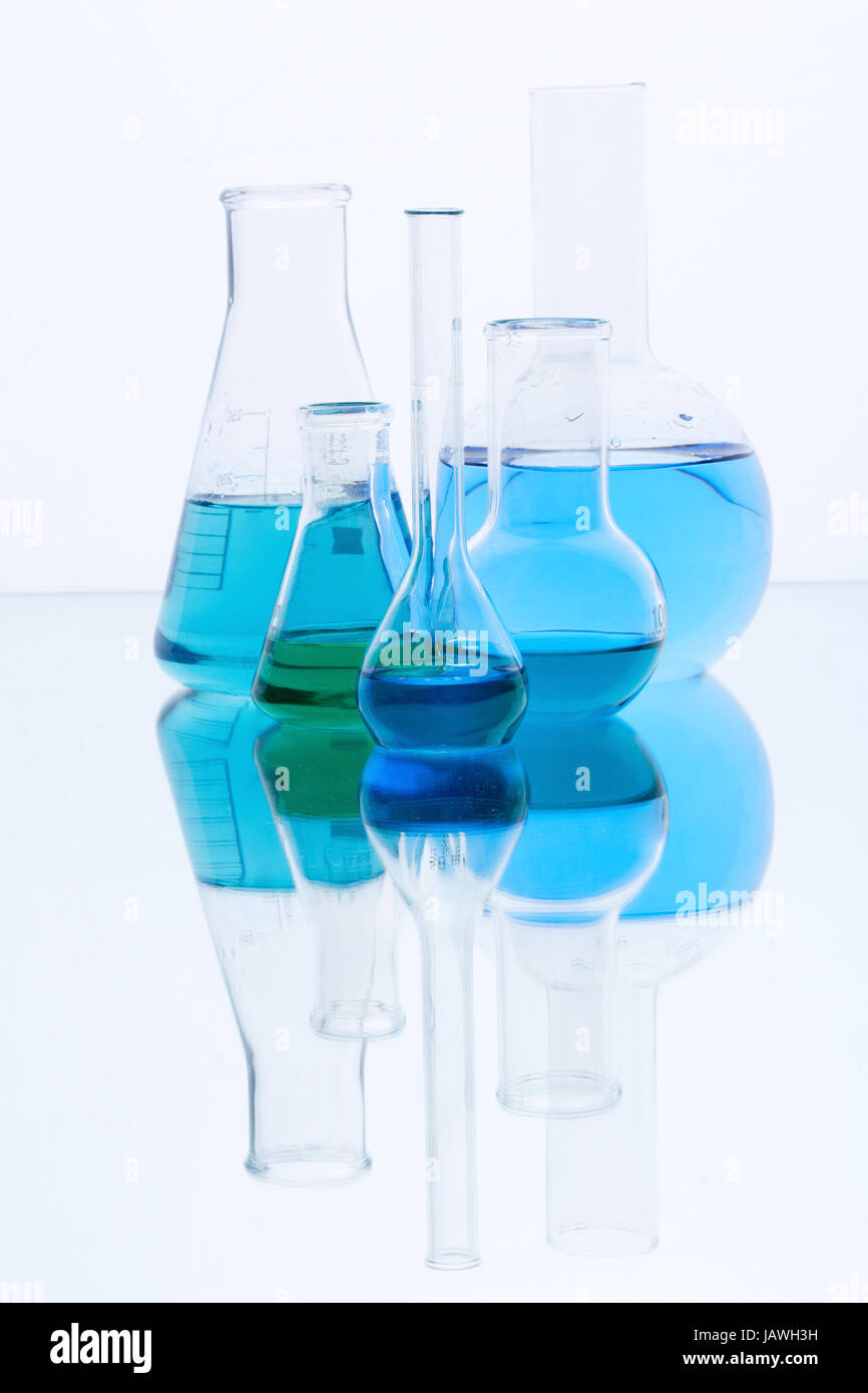 Image of several flasks with blue liquid in laboratory Stock Photo - Alamy