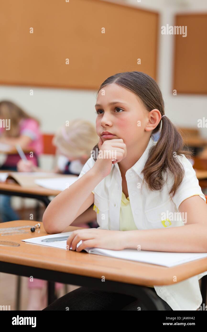Pretty primary school girl sitting hi-res stock photography and images ...