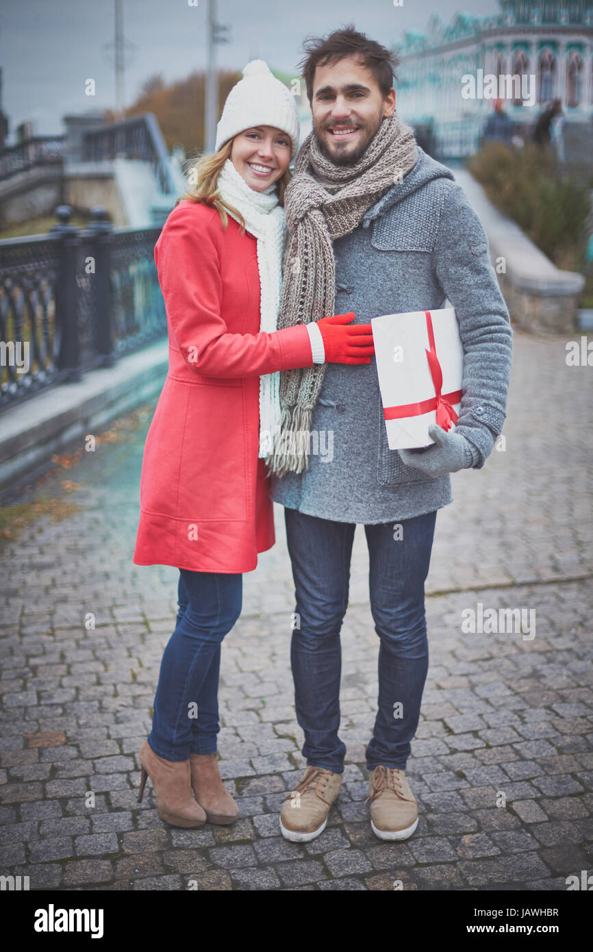 Positive couple in coats hi-res stock photography and images - Alamy
