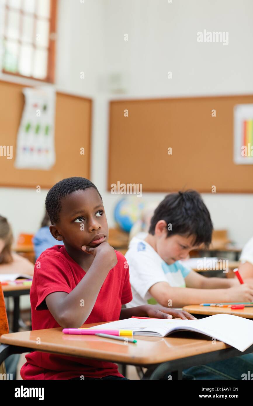 Side view of thoughtful student Stock Photo - Alamy