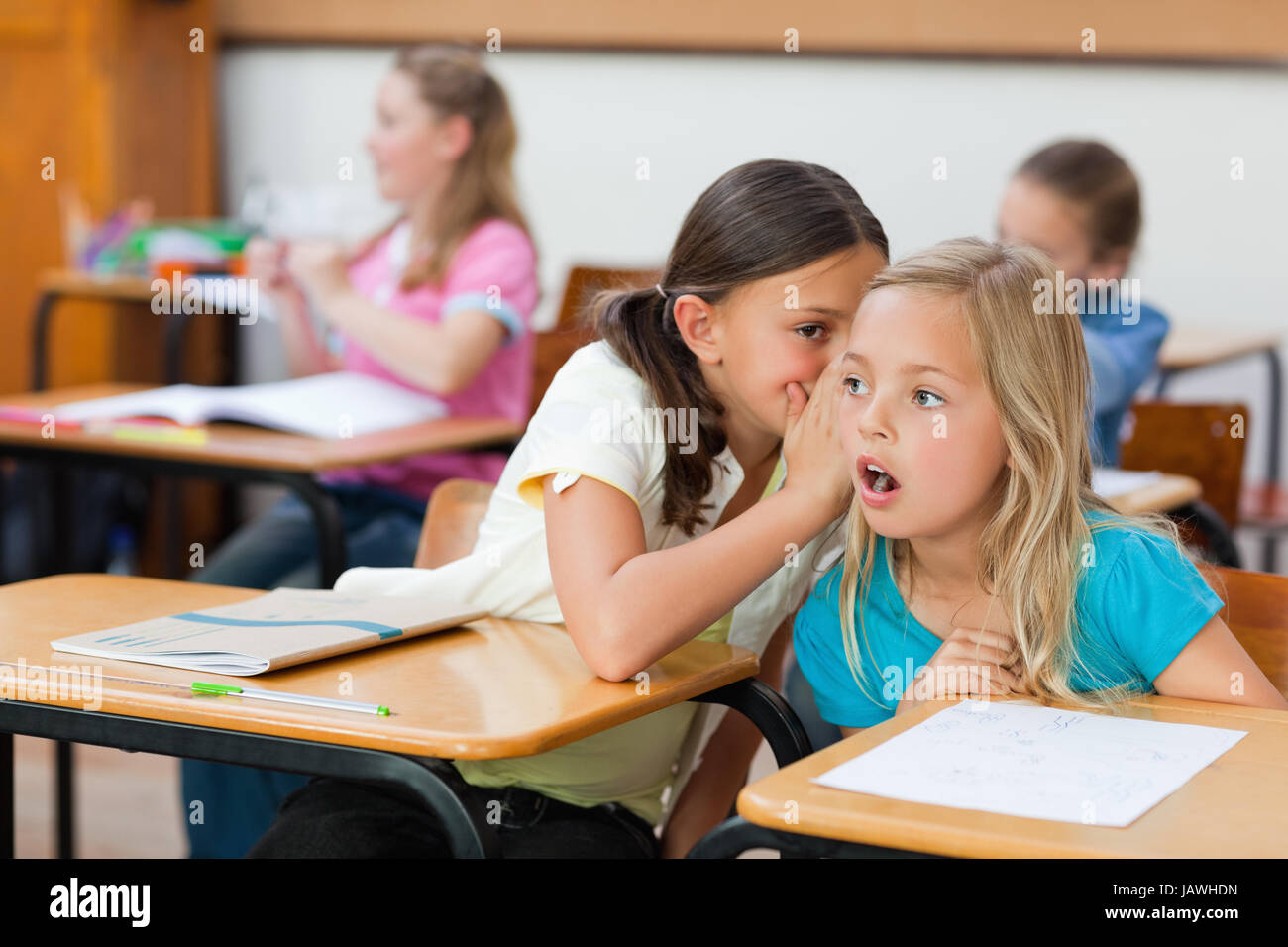 Students whispering classroom hi-res stock photography and images - Alamy