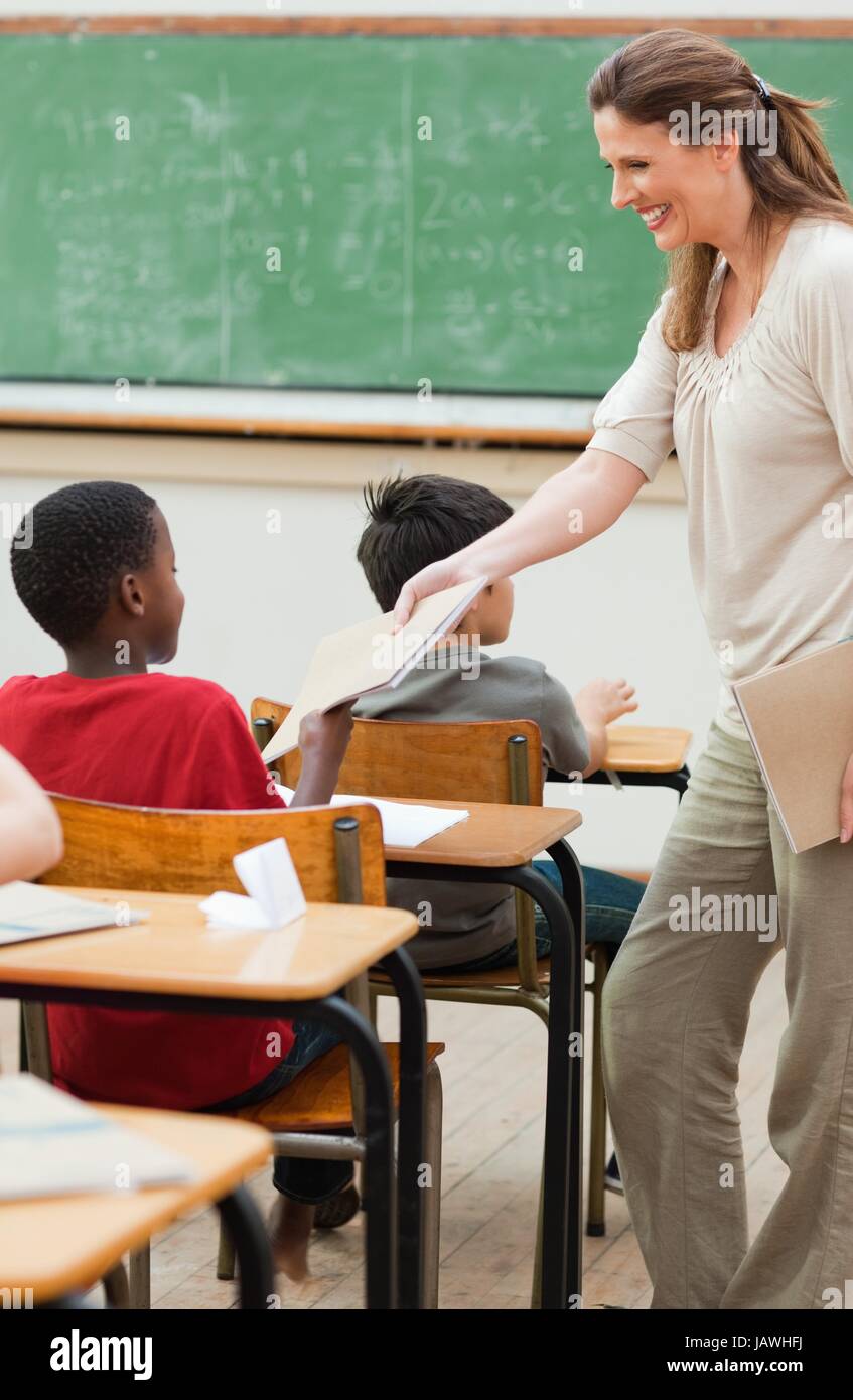 Child collecting books hi-res stock photography and images - Alamy