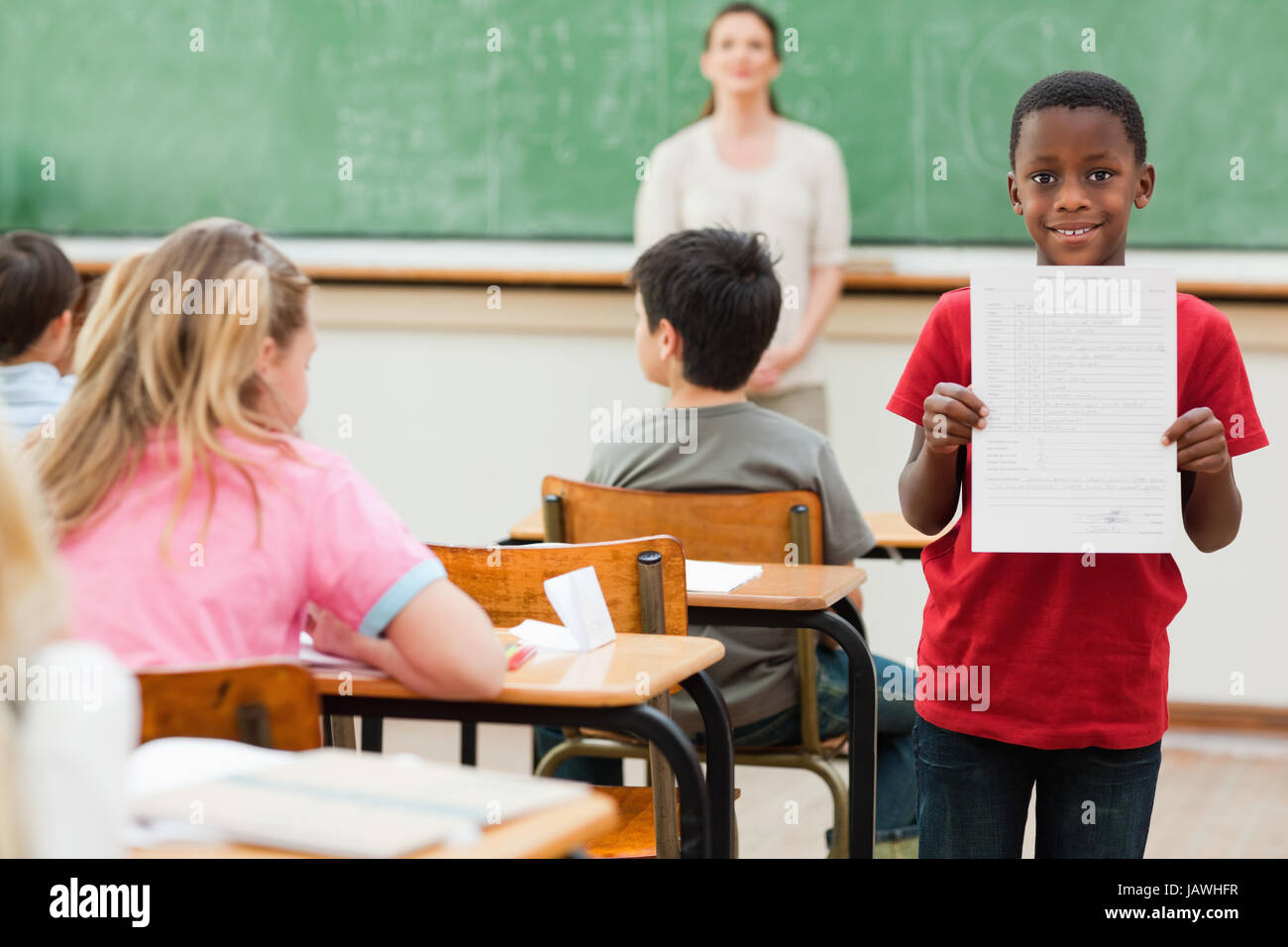 Female teacher presenting school hi-res stock photography and images ...