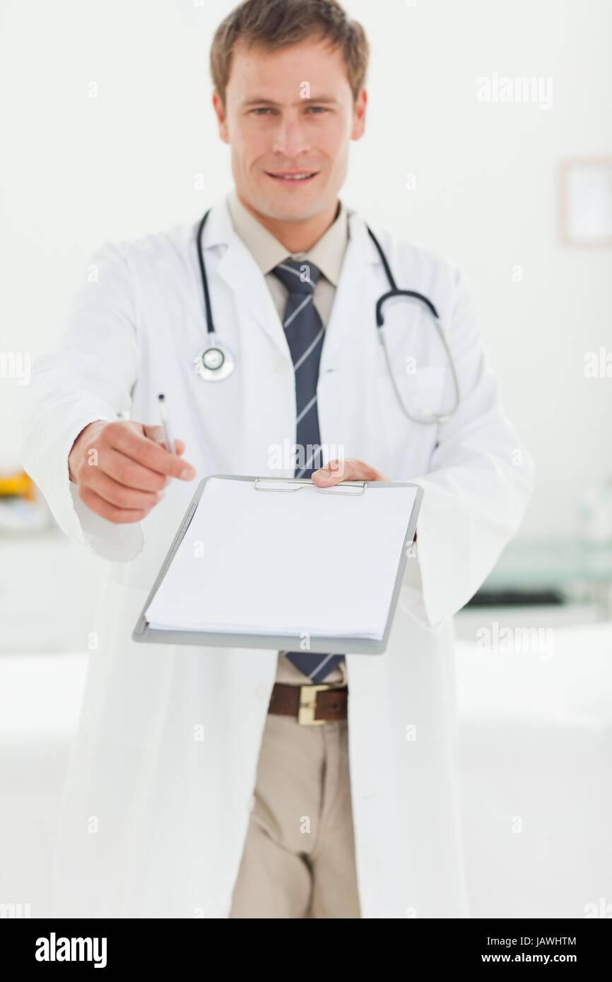 Doctor asking for signature Stock Photo - Alamy