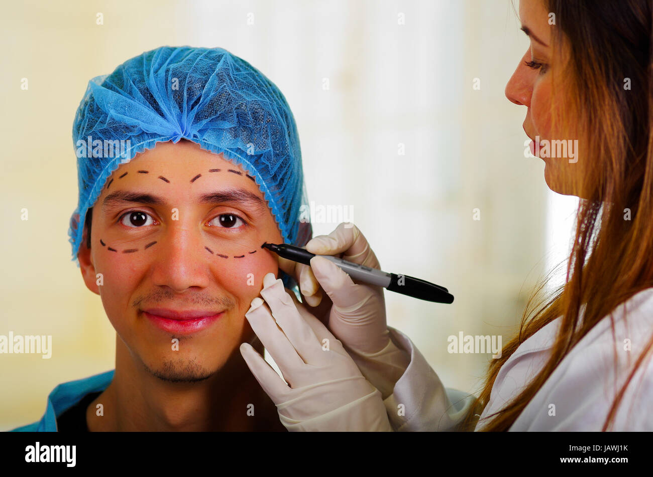 Man face surgery marks hi-res stock photography and images - Alamy
