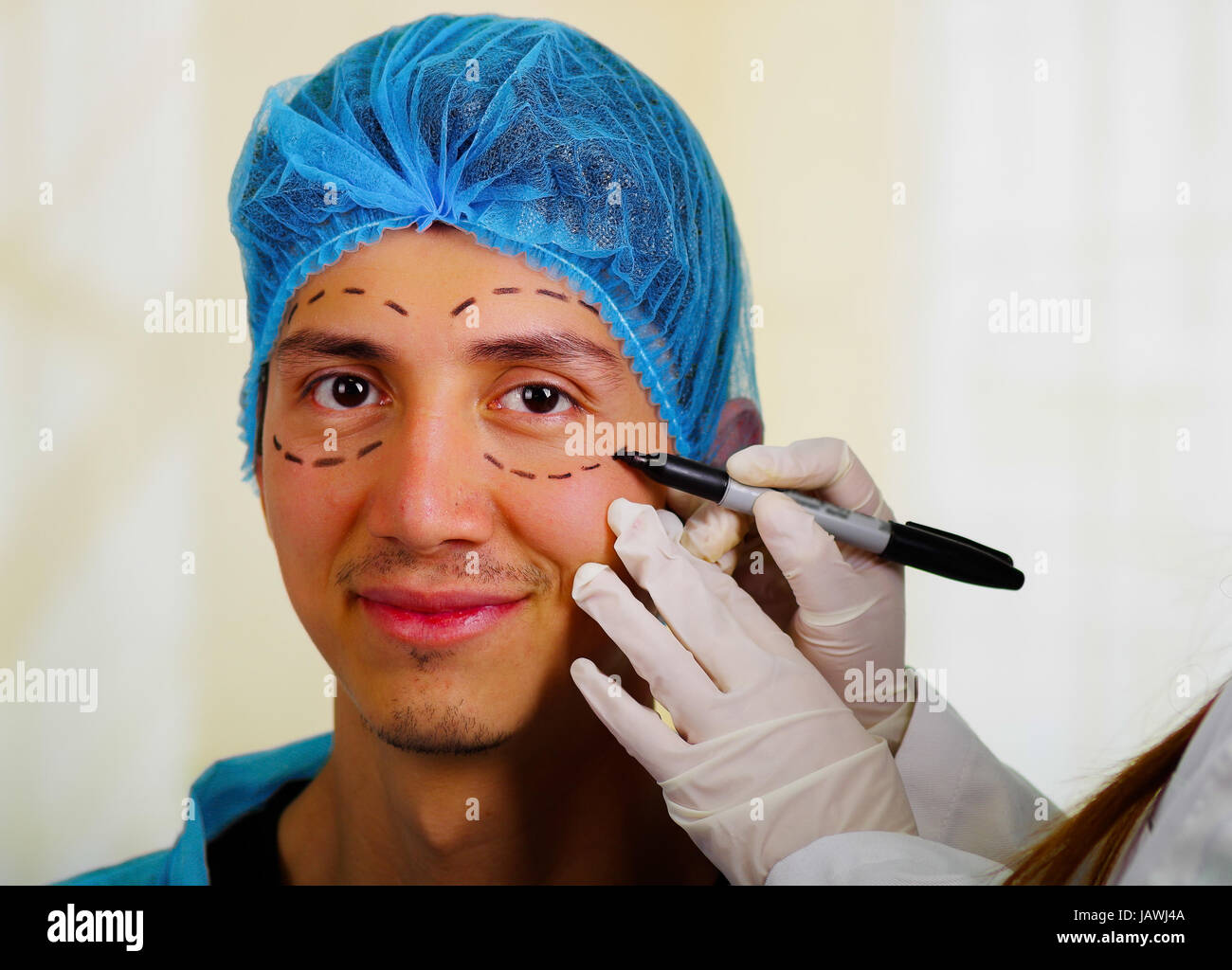 Man face surgery marks hi-res stock photography and images - Alamy