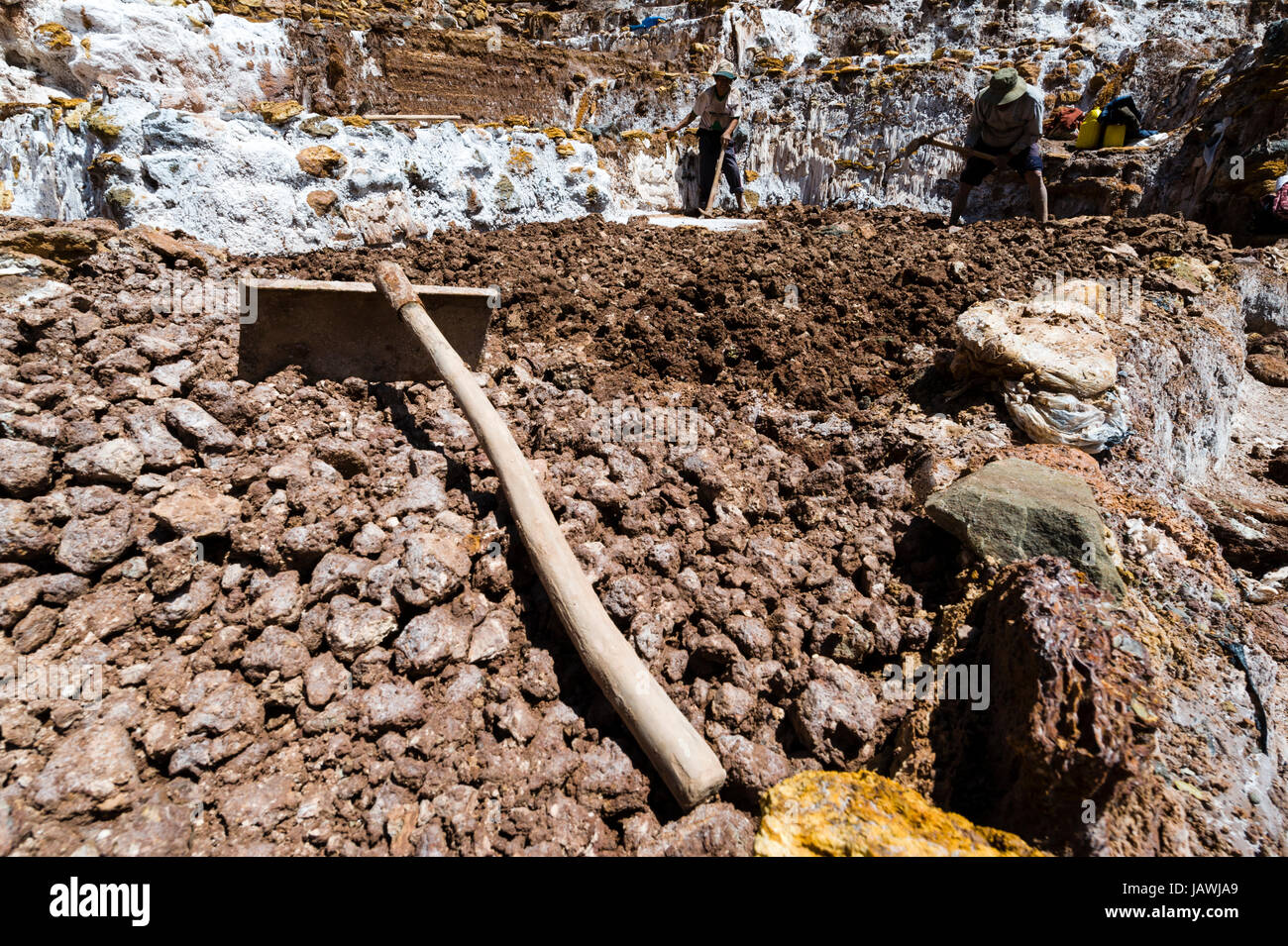 A spade lying on rocks at a salt mine Stock Photo - Alamy