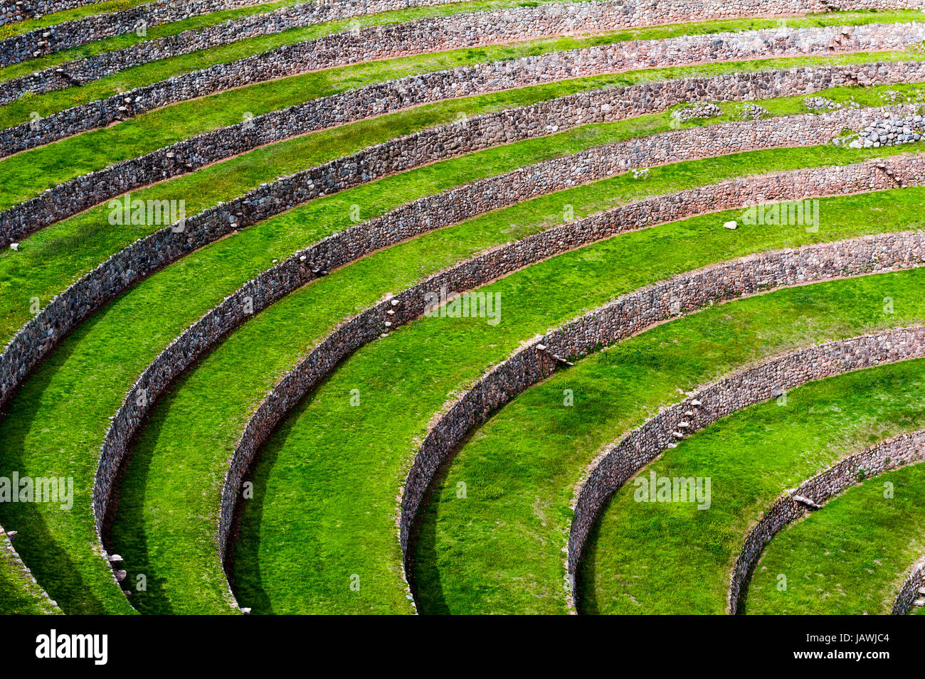 An Inca site with stone wall terraces for growing agricultural crops by ...