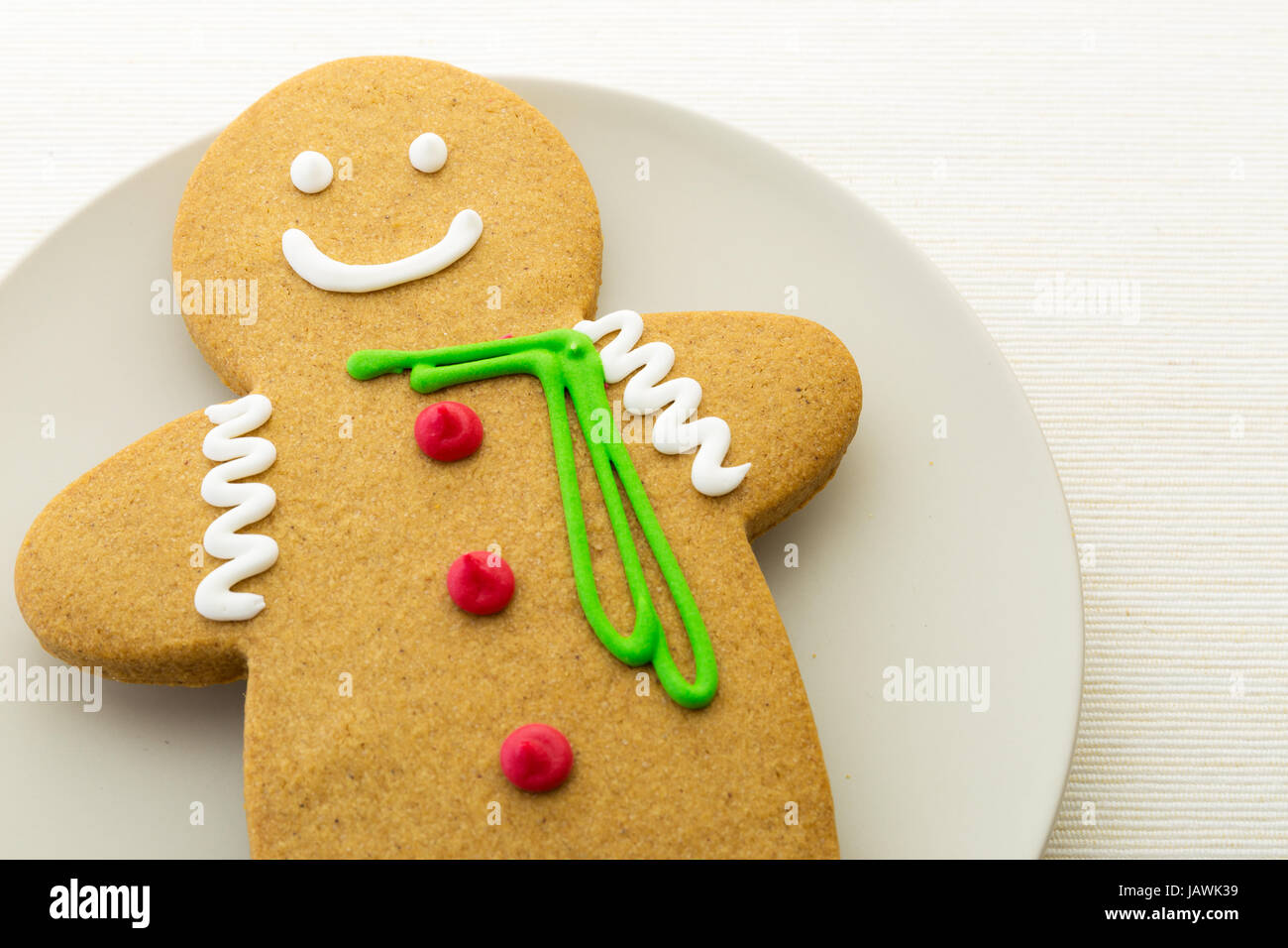 Gingerbread man on white Stock Photo - Alamy