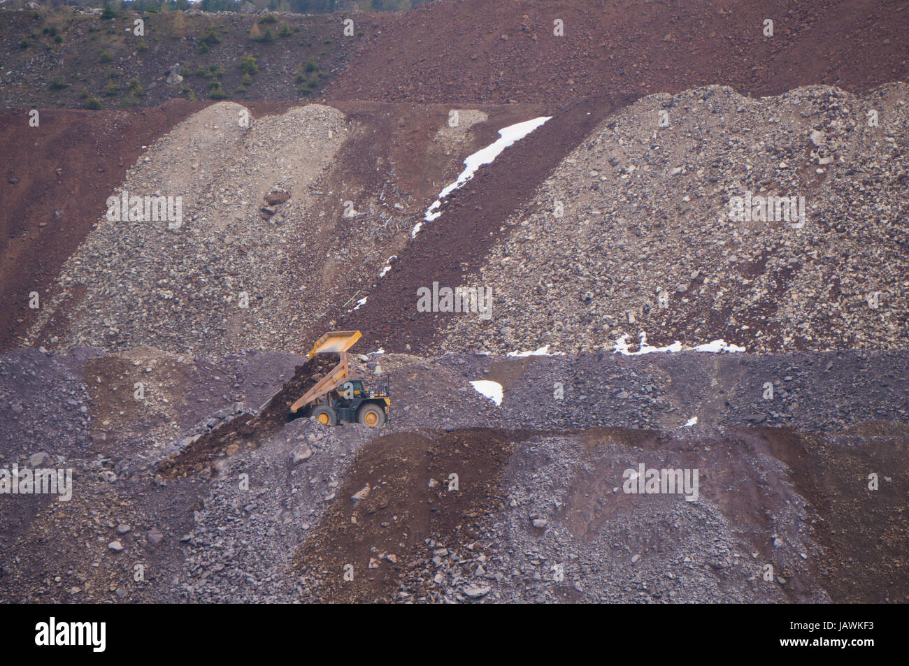 A large mine truck dumping its load Stock Photo - Alamy
