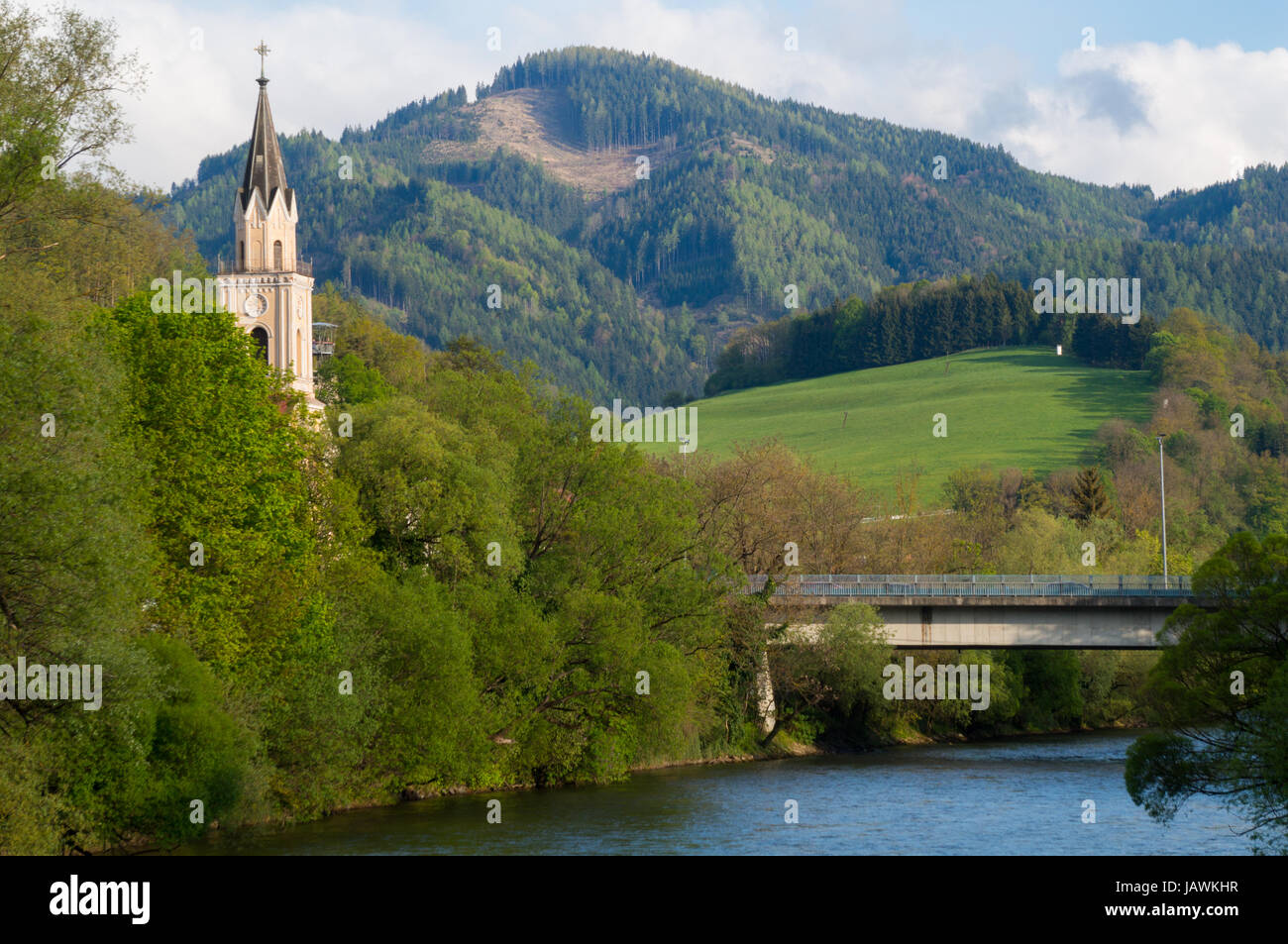 A church spire overlooking the river Mur Stock Photo - Alamy