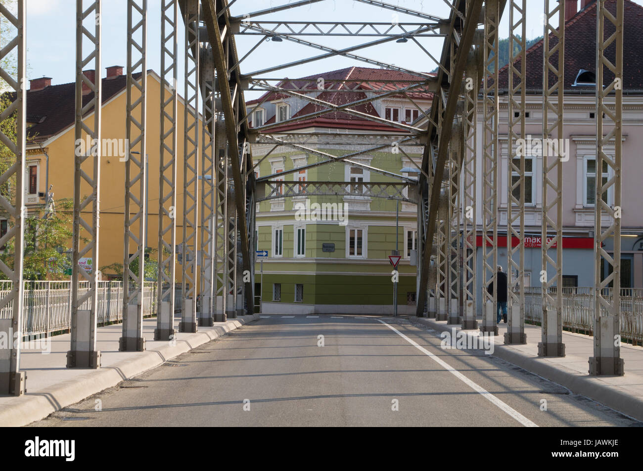 Bridge with beautiful old town buildings at its end Stock Photo - Alamy