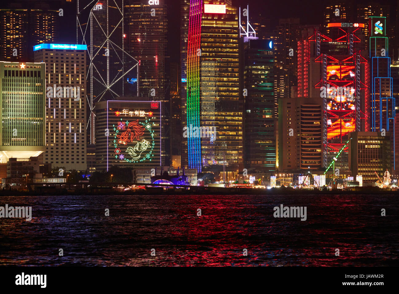 Victoria Harbour and light show on skyscrapers, Central, Hong Kong ...