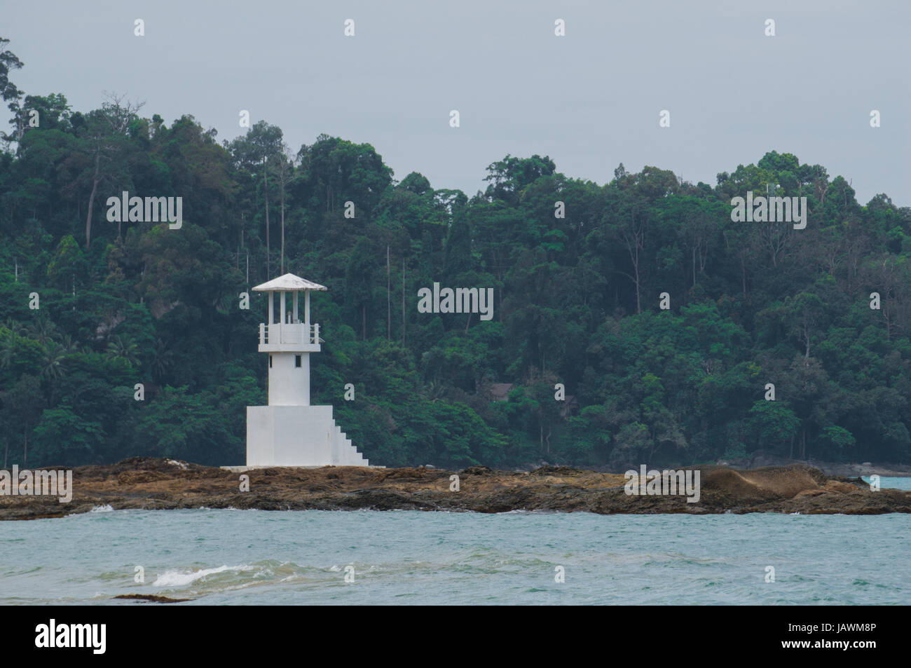 White beacon just offshore Stock Photo - Alamy