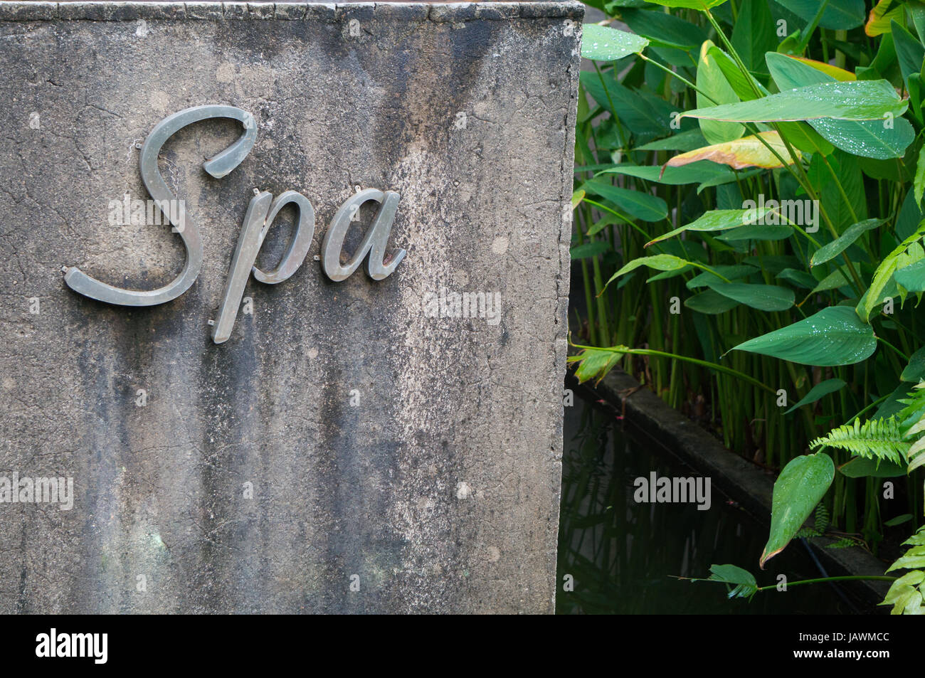 The word spa on a concrete wall Stock Photo - Alamy