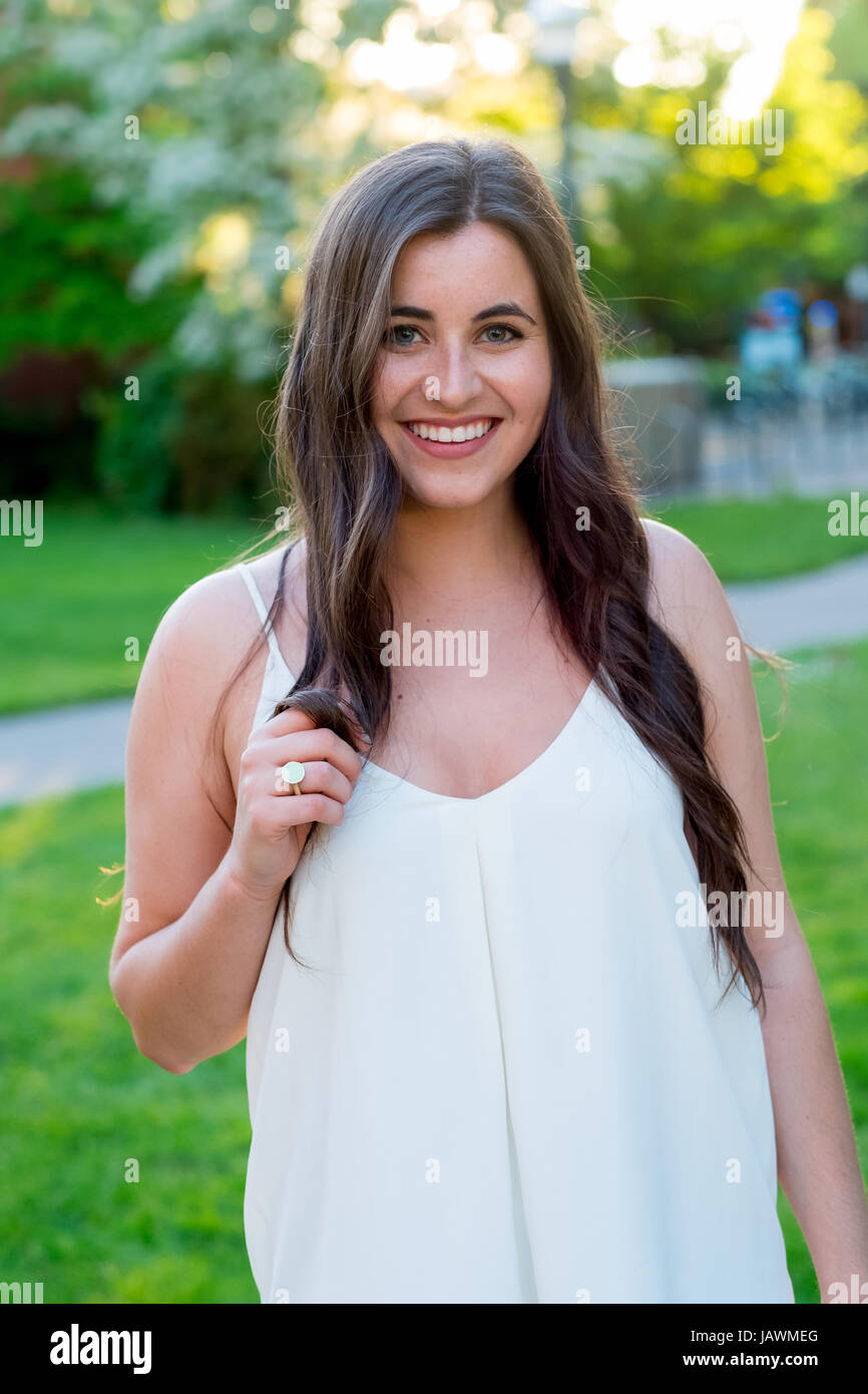Female lifestyle portrait of a college student during her senior year ...