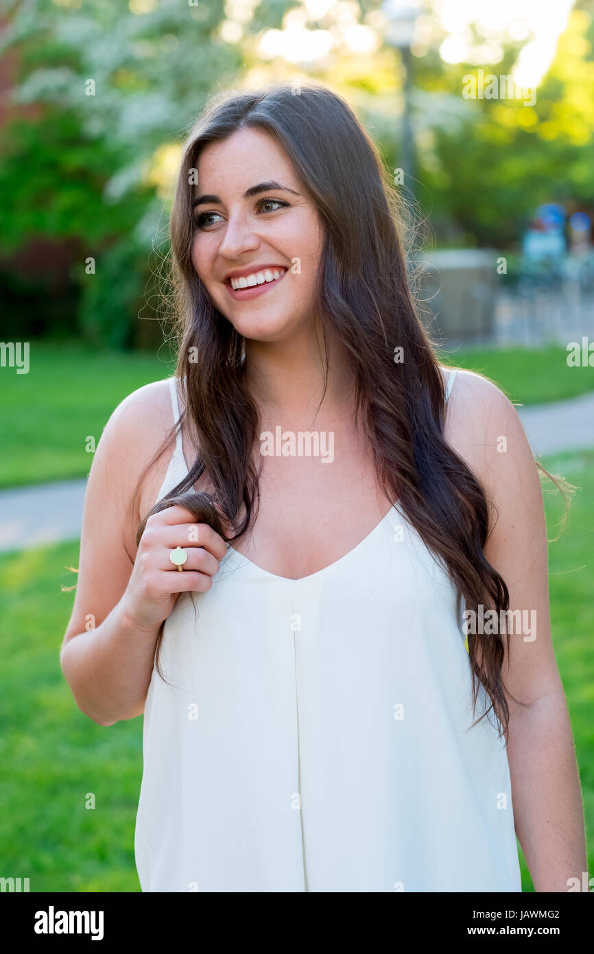 Female lifestyle portrait of a college student during her senior year ...