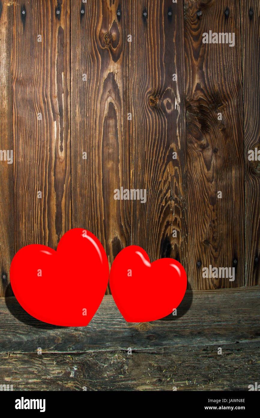 two hearts on a wooden scene Stock Photo - Alamy