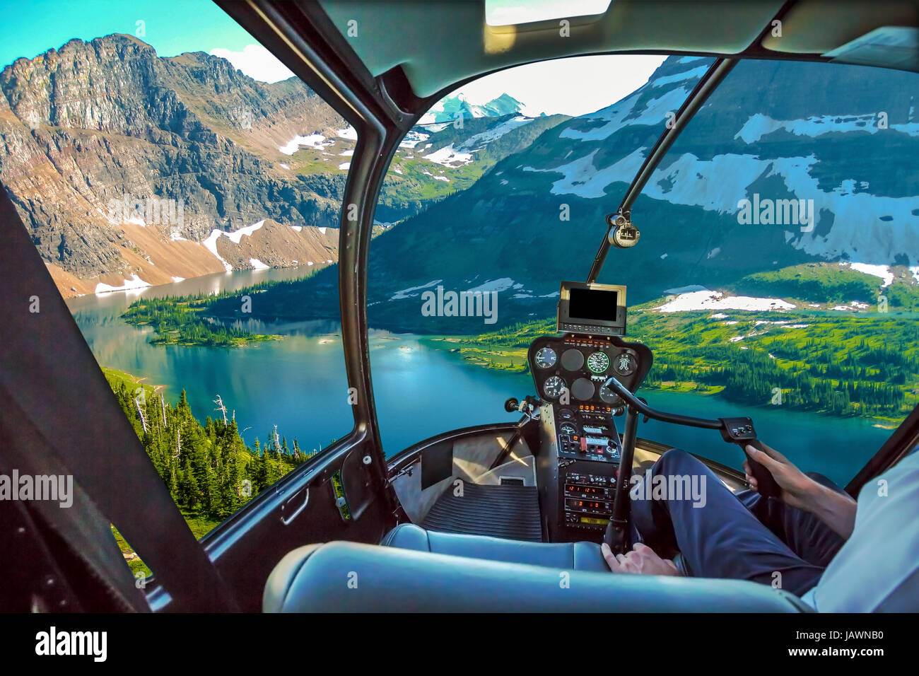 Helicopter cockpit with pilot arm and control console inside the cabin ...