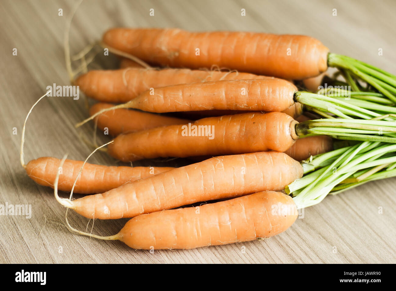 Bunch of fresh carrots vegetable Stock Photo - Alamy