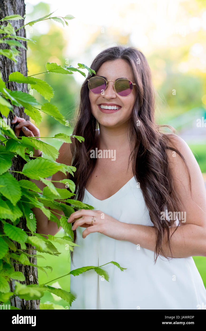 Female lifestyle portrait of a college student during her senior year ...