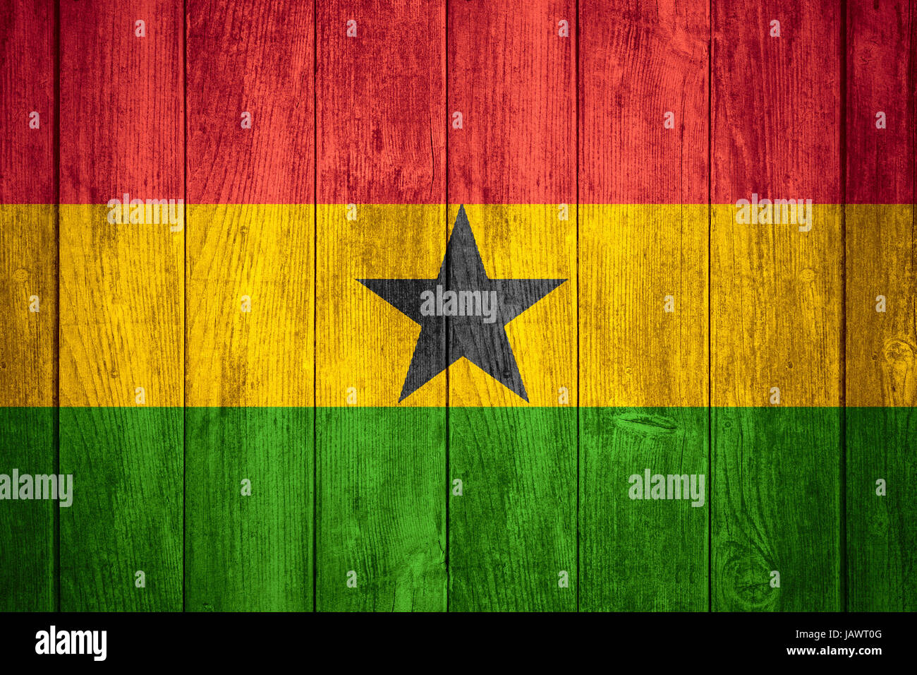 flag of Ghana or red, yellow, black and green Ghanaian banner on wooden ...
