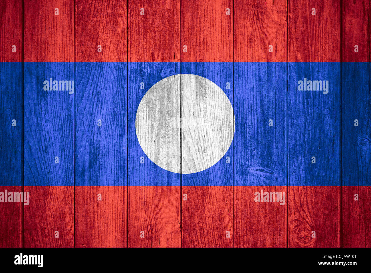 flag of Laos or white, red, blue and white banner on wooden background ...