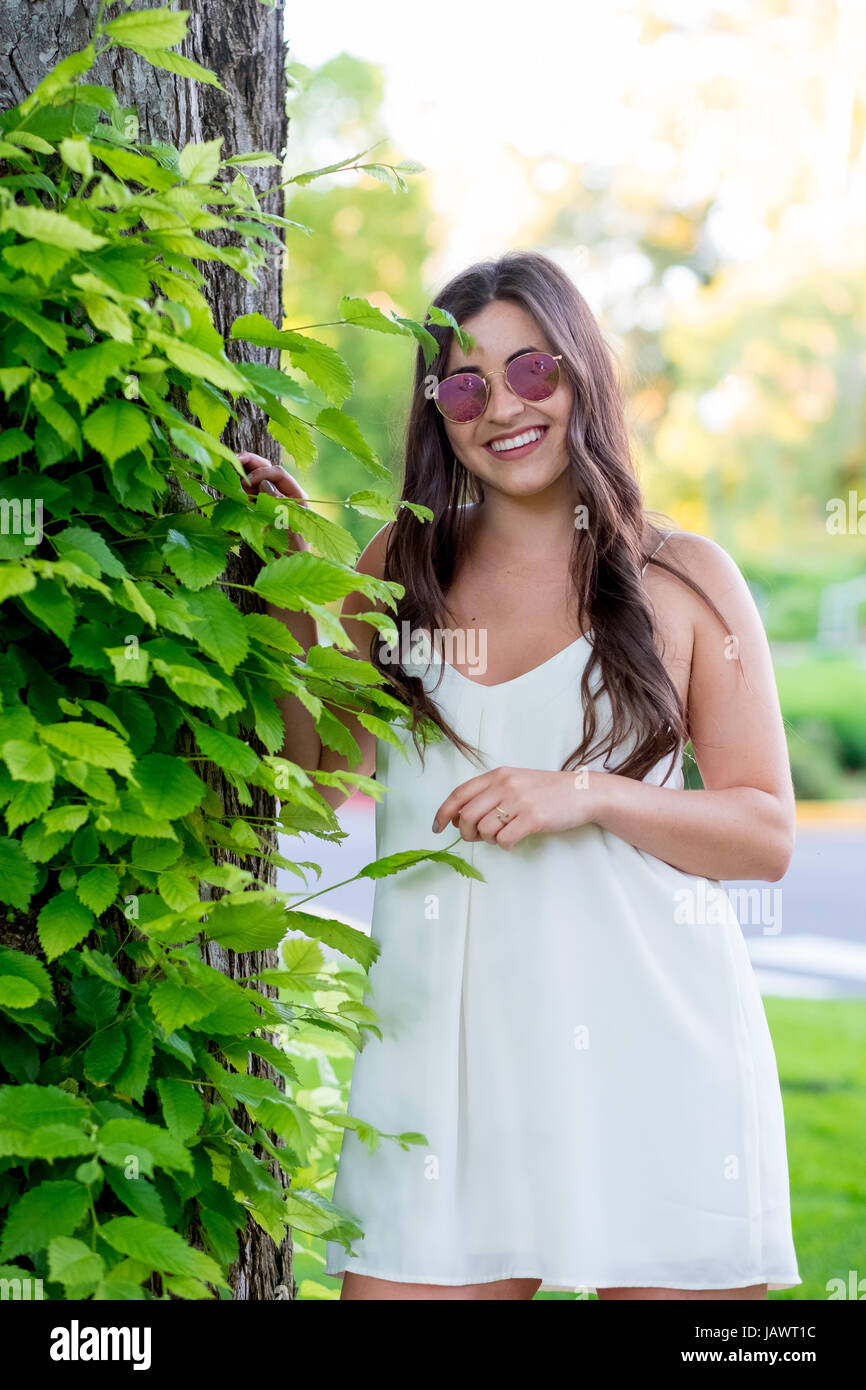 Female lifestyle portrait of a college student during her senior year ...