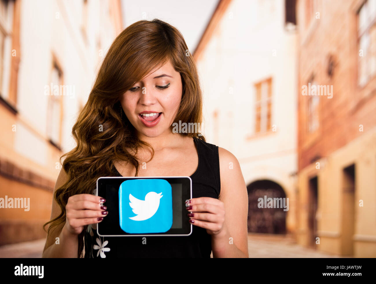 Person using twitter tablet hi-res stock photography and images - Alamy
