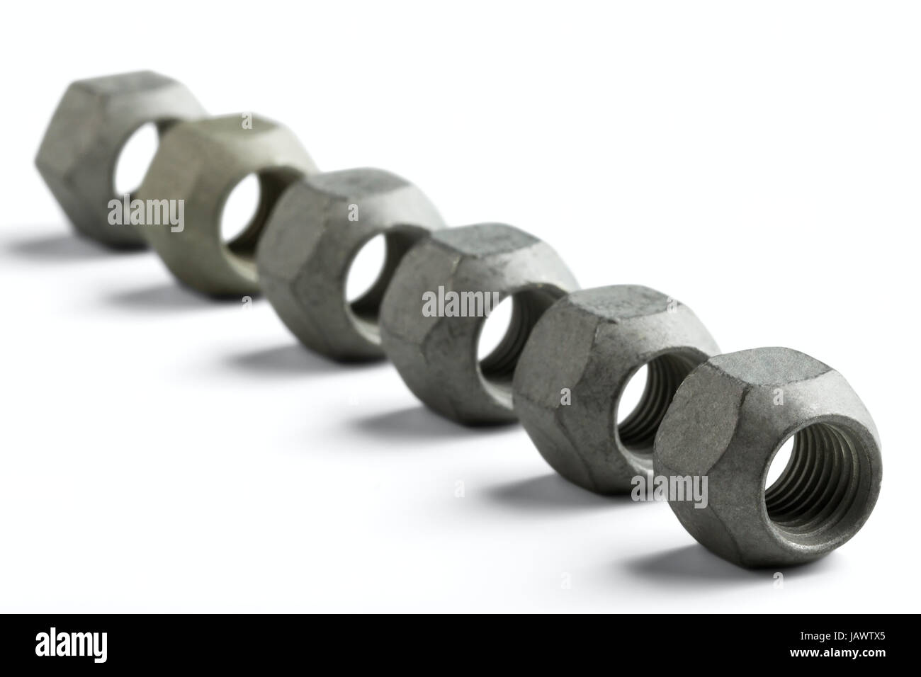 Wheel nuts isolated on a white background Stock Photo - Alamy
