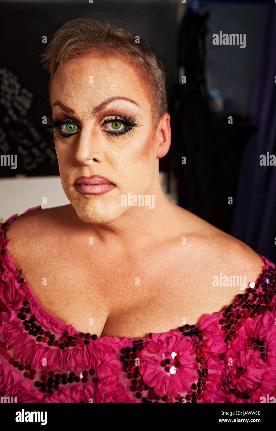 Serious drag queen without wig in dressing room Stock Photo - Alamy