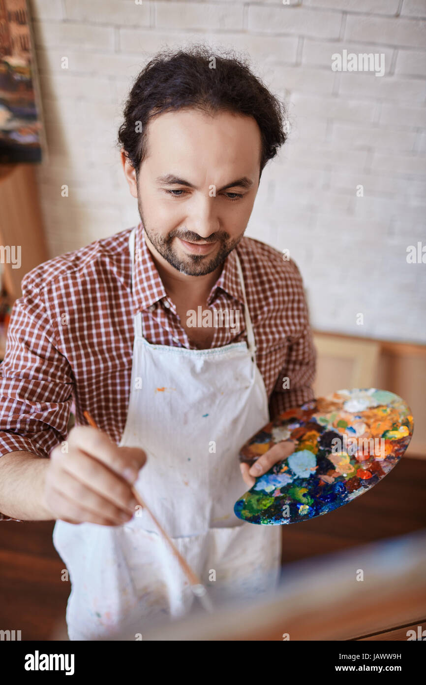Talented Artist Enjoying Work in Art-Studio Stock Photo - Alamy