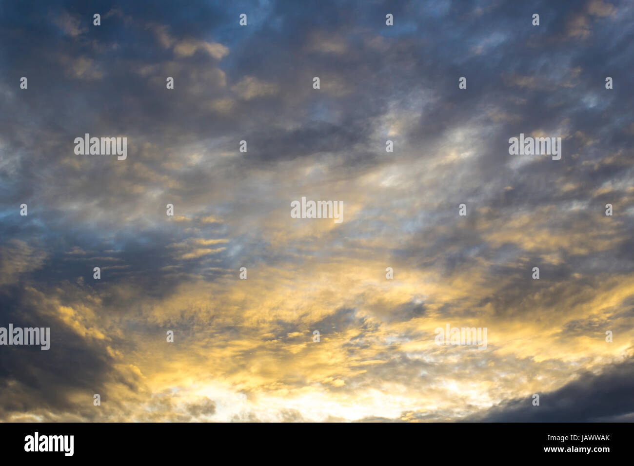 Bright yellow colors of sunrise sky background Stock Photo - Alamy