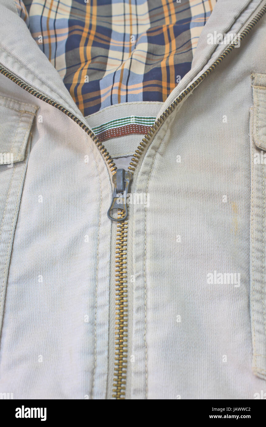 Close up old zipper open on jacket Stock Photo - Alamy