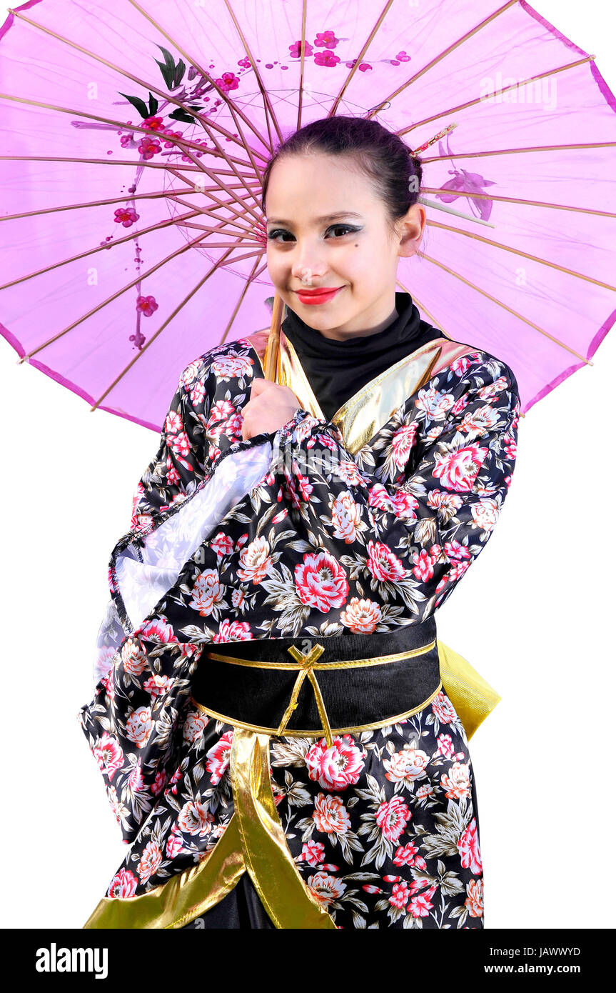 Beautiful young girl posing dressed as a Japanese geisha for Carnival ...