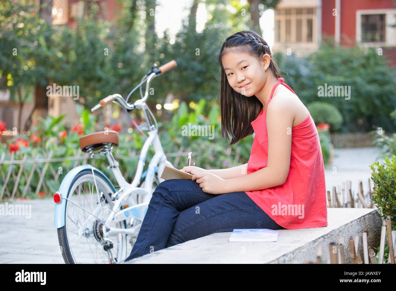 Chinese girl bike 11 years hi-res stock photography and images - Alamy