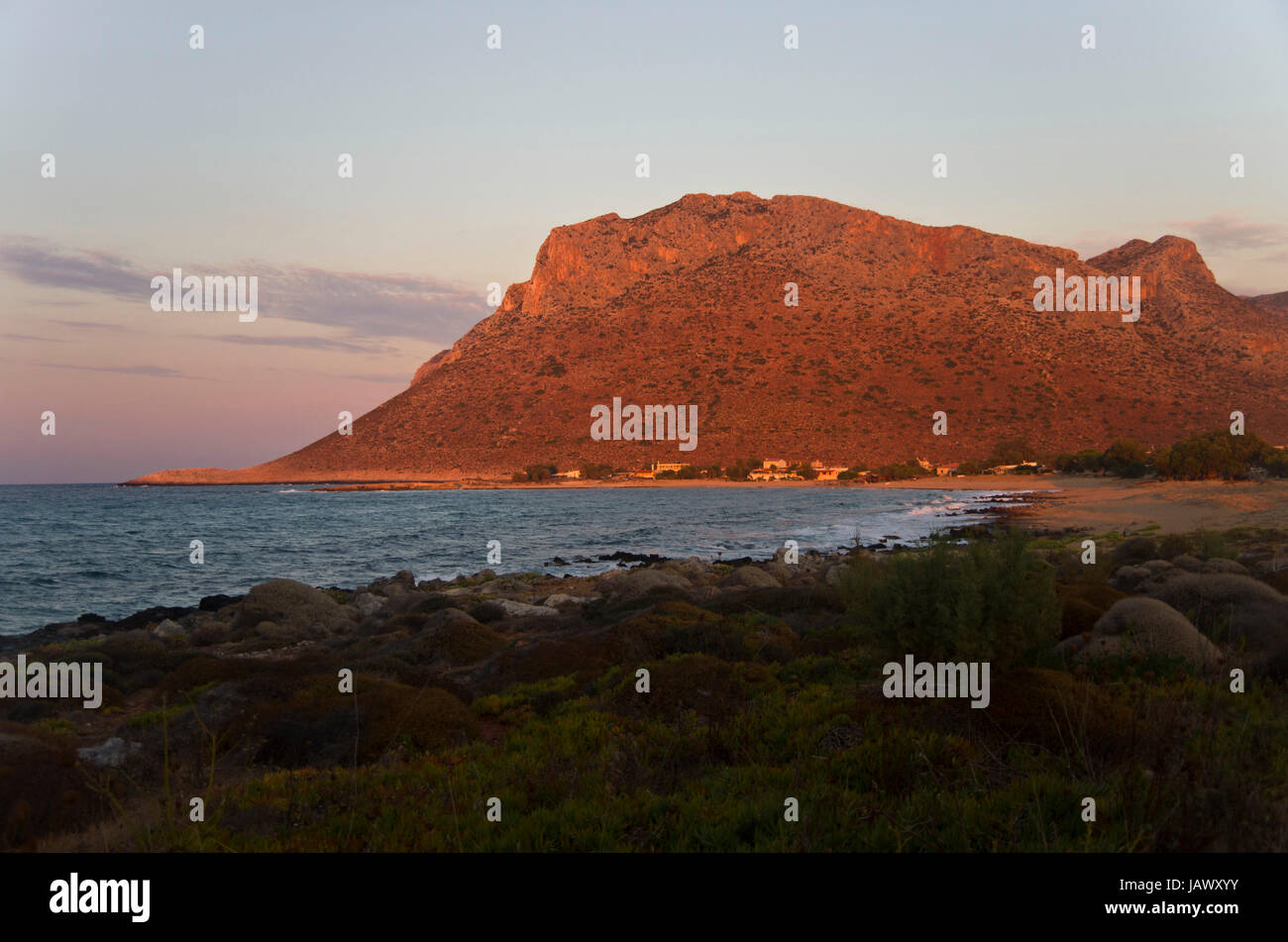 Red rocks at Zorbas Beach, Crete island Stock Photo - Alamy