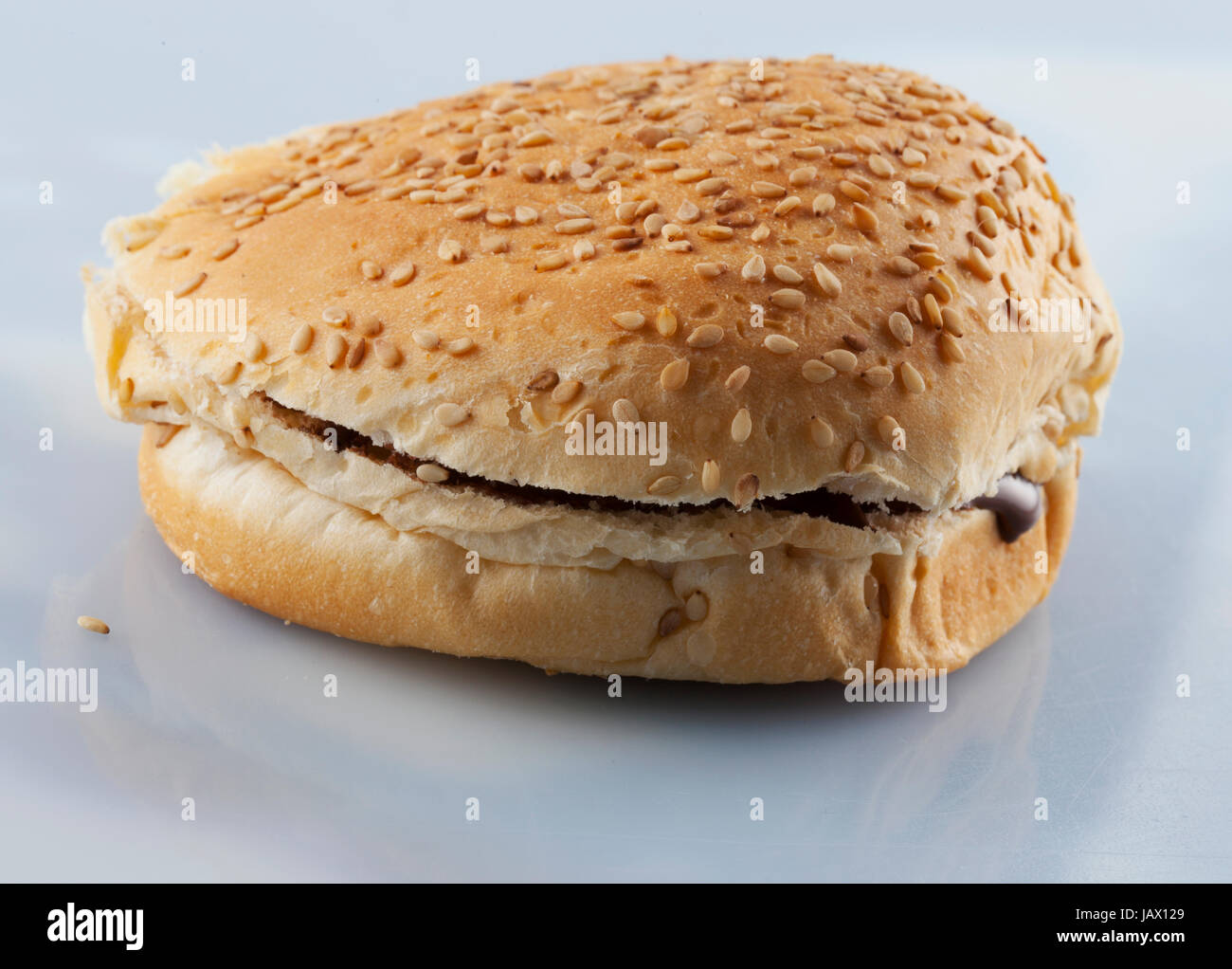 Sesame sandwich with chocolate over white background Stock Photo - Alamy