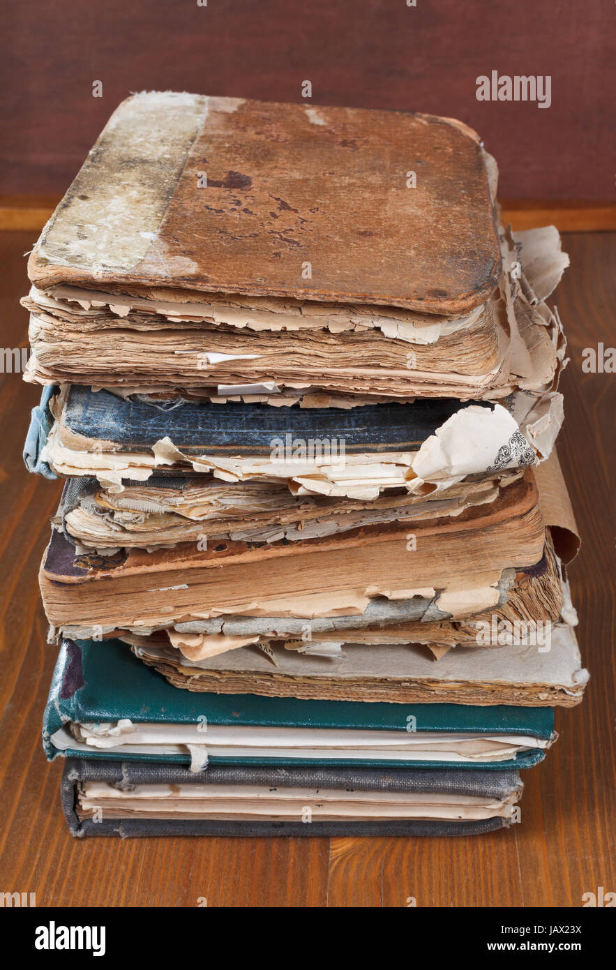 stack antique books on wooden bookshelf Stock Photo - Alamy