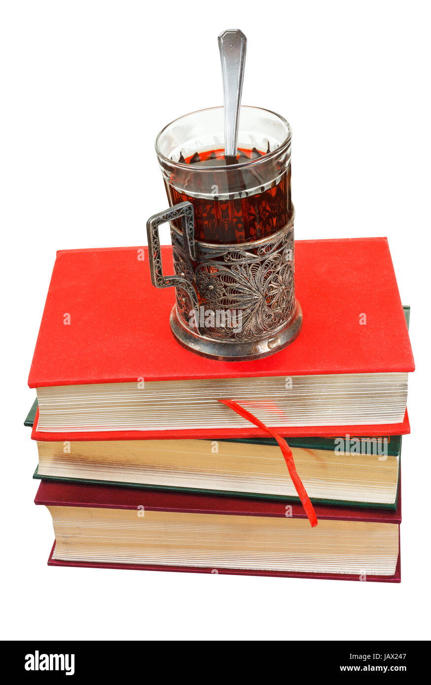 retro glass of tea on stack of books isolated on white background Stock ...