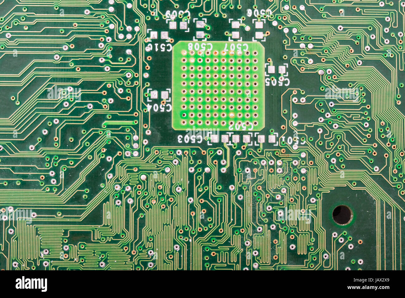 Close-up photo of electronic circuit board with integrated microchips ...