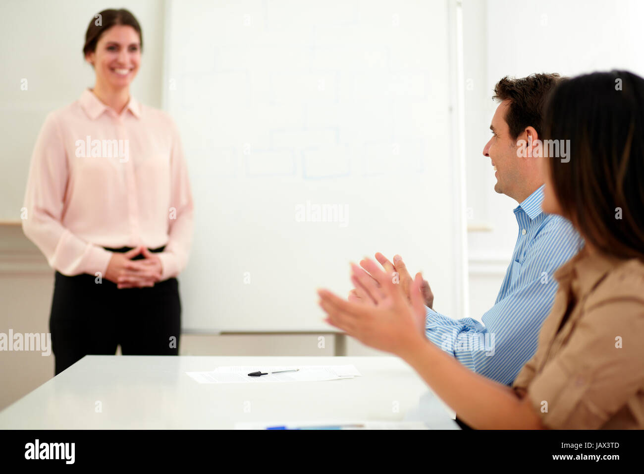 Colleagues giving applause beautiful hi-res stock photography and ...
